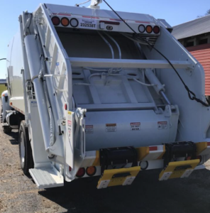 What Are Rear-Load Trash Trucks And How Do They Work - Seagull Disposal